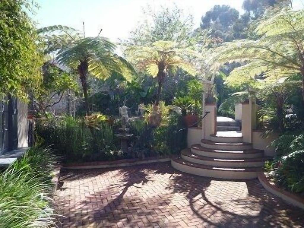 Charming Home with Courtyards & Gardens Pet Policy